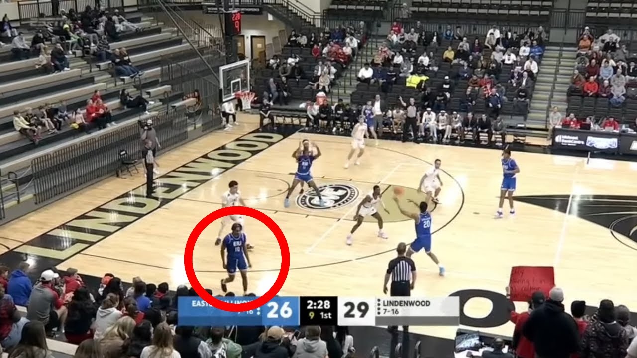 Eastern Illinois player tries to slap fan sitting courtside - YouTube