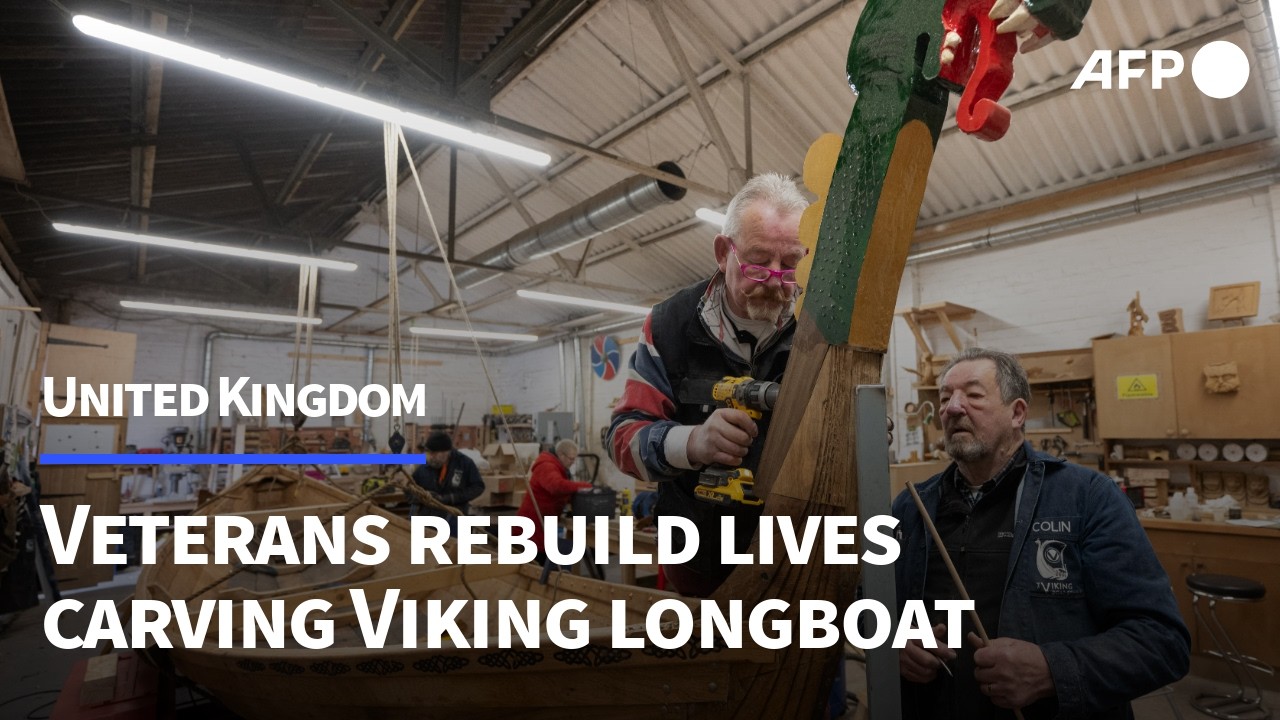 UK military veterans rebuild lives carving Viking longboat | AFP - YouTube
