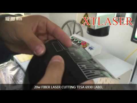 fiber laser machine Cutting Tesa 6930 label by XTLASER - YouTube