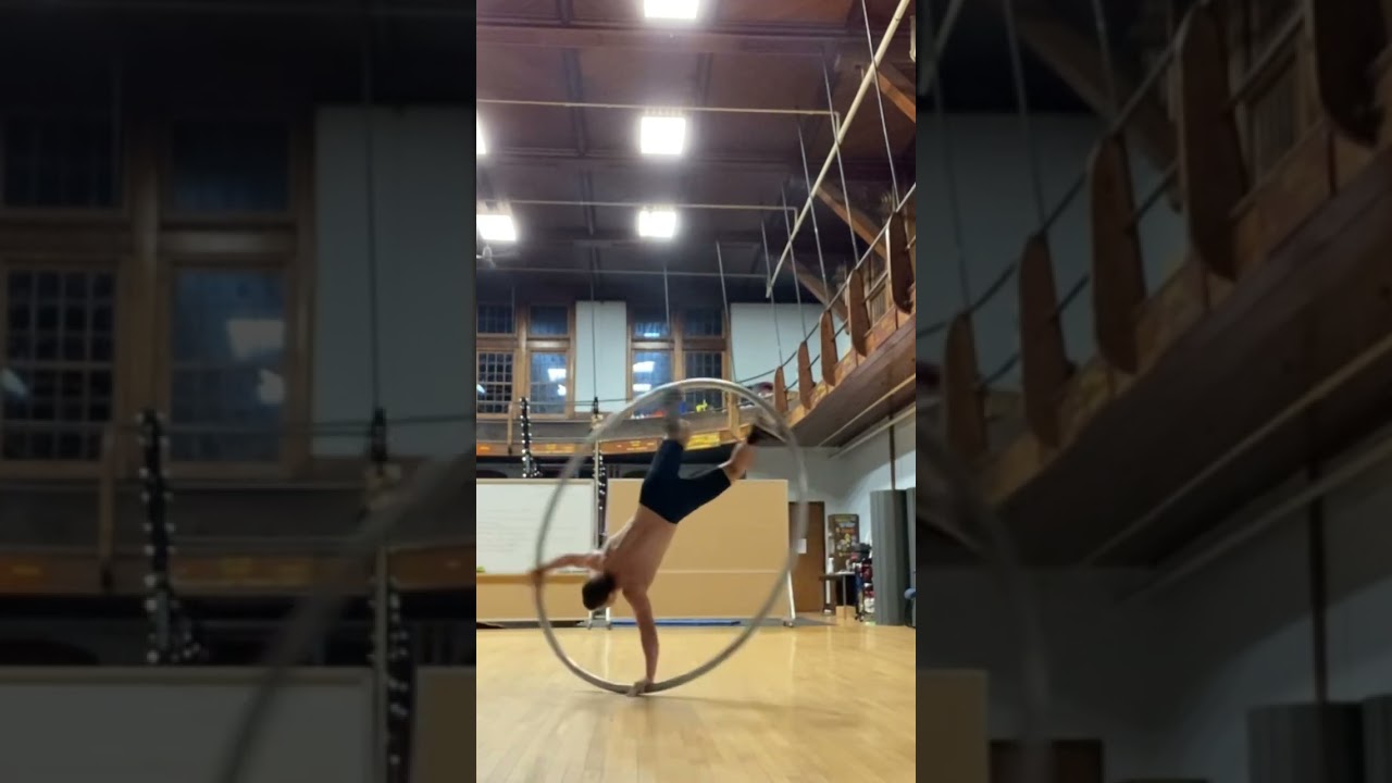 Cyr Wheel acrobatics - YouTube