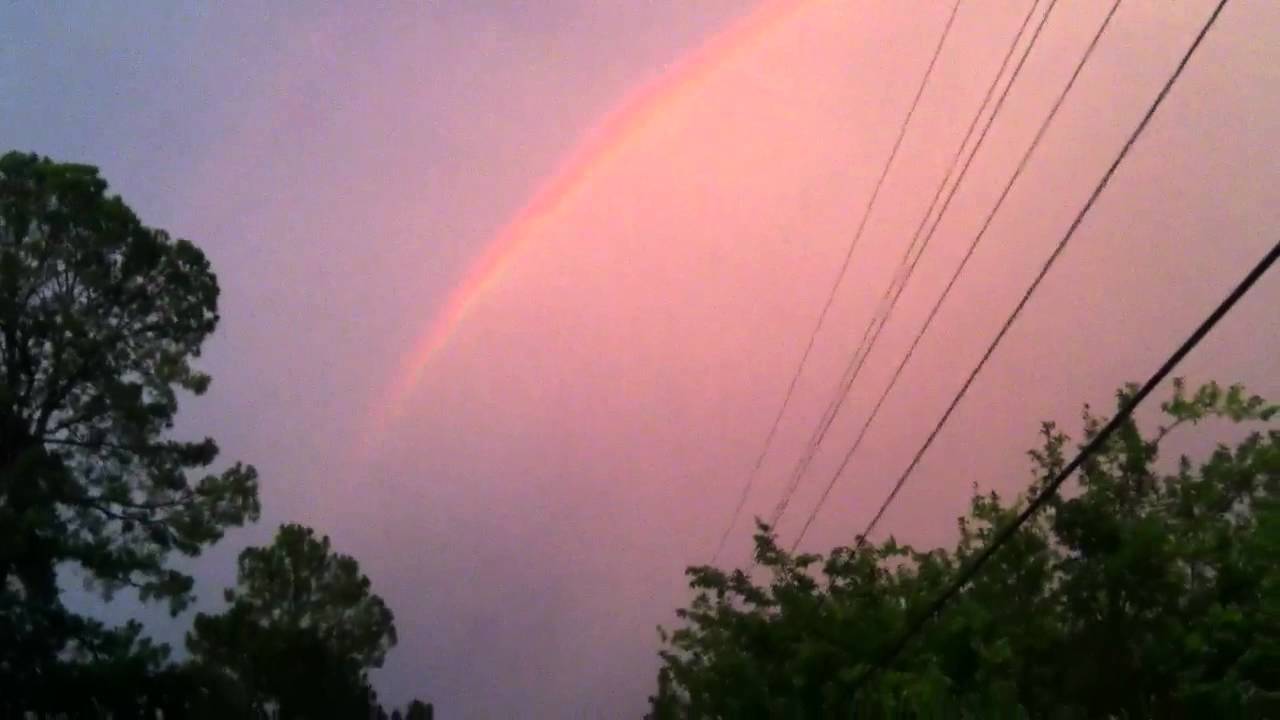 Complete rainbow with lightning - YouTube