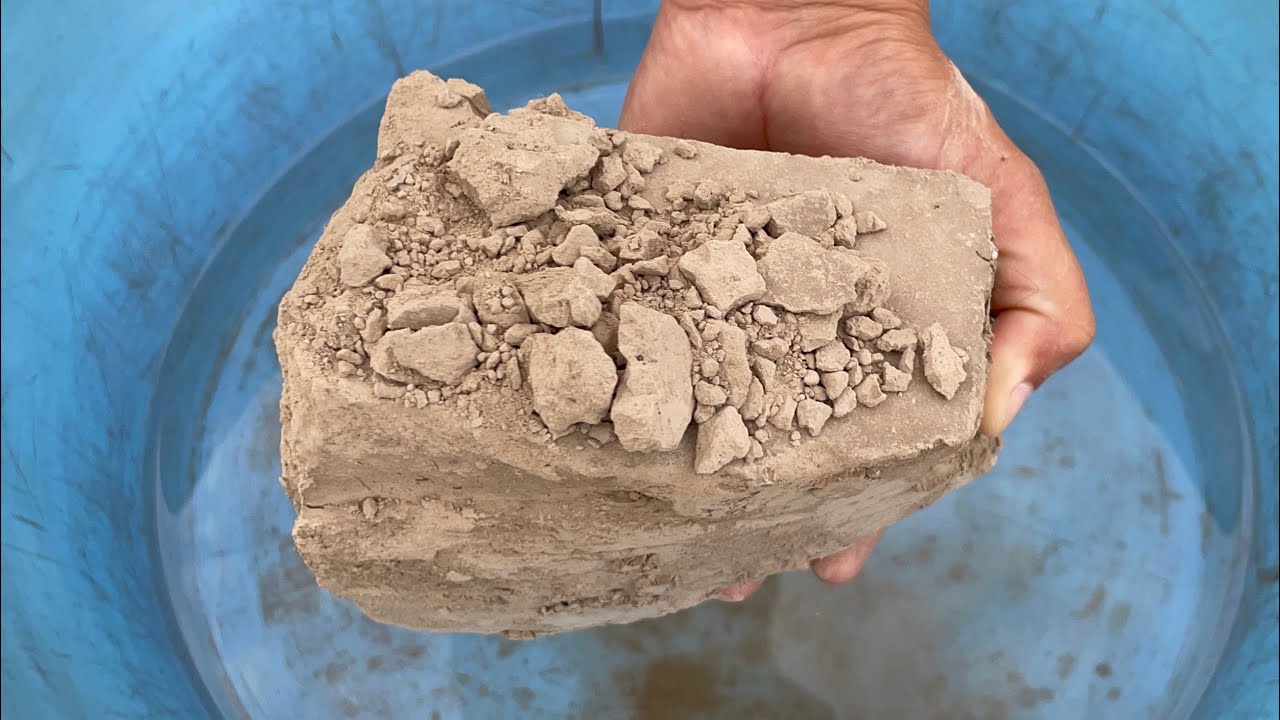 pure mud dirt crumbling in water - YouTube