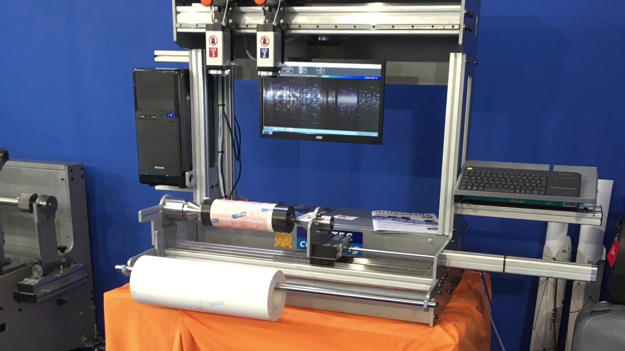 Demo of mounting on a Narrow Web table top plate mounter - YouTube