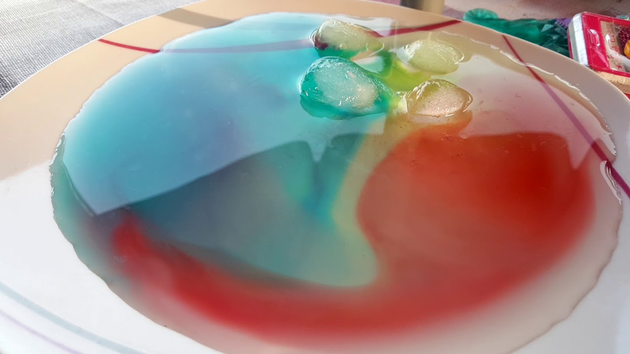 melting colored ice-ball's Time Lapse Time Lapse - YouTube