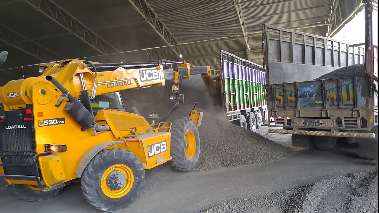 JCB loadall work in clinker unloading cement industries - YouTube