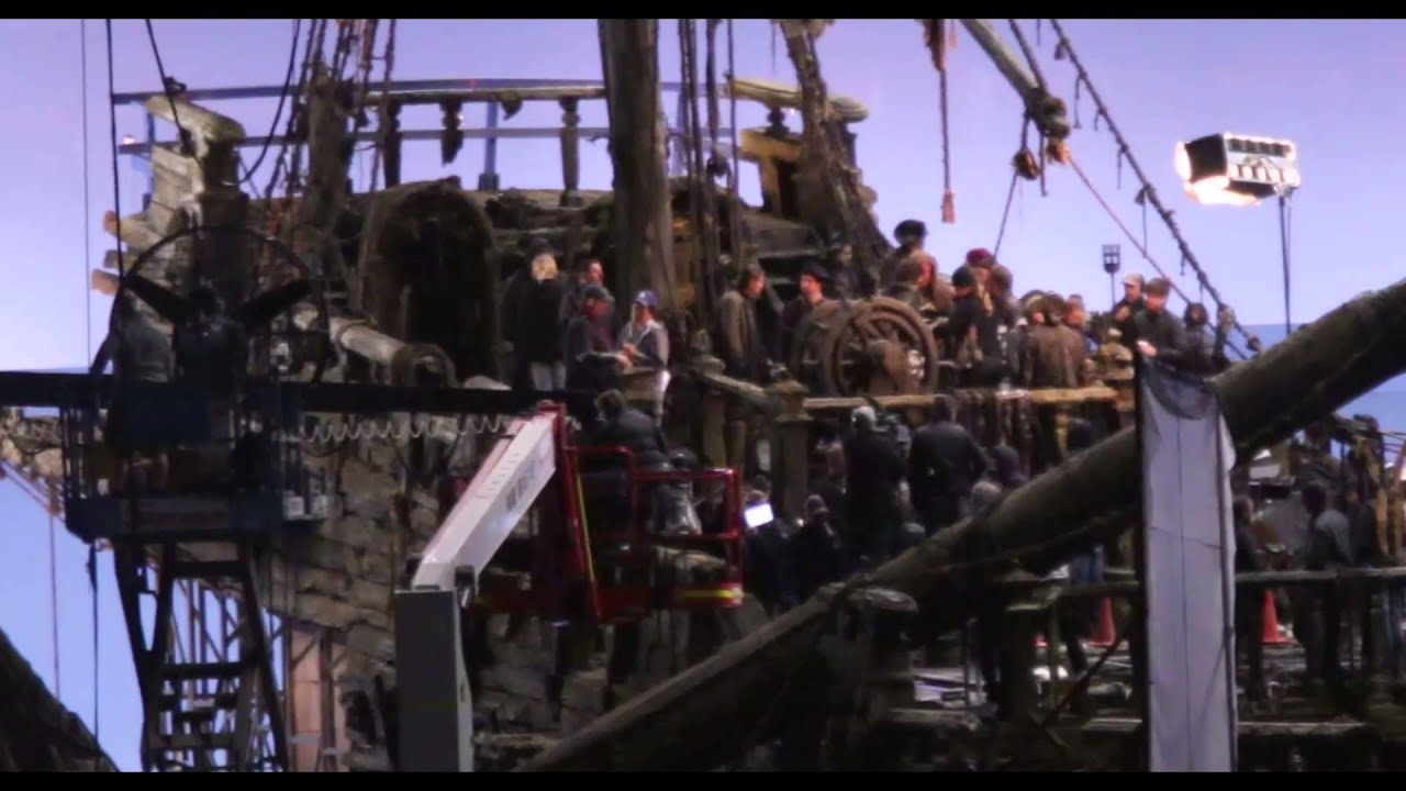 Geoffrey Rush as Captain Barbossa on the deck of the mystery ghost ship ...