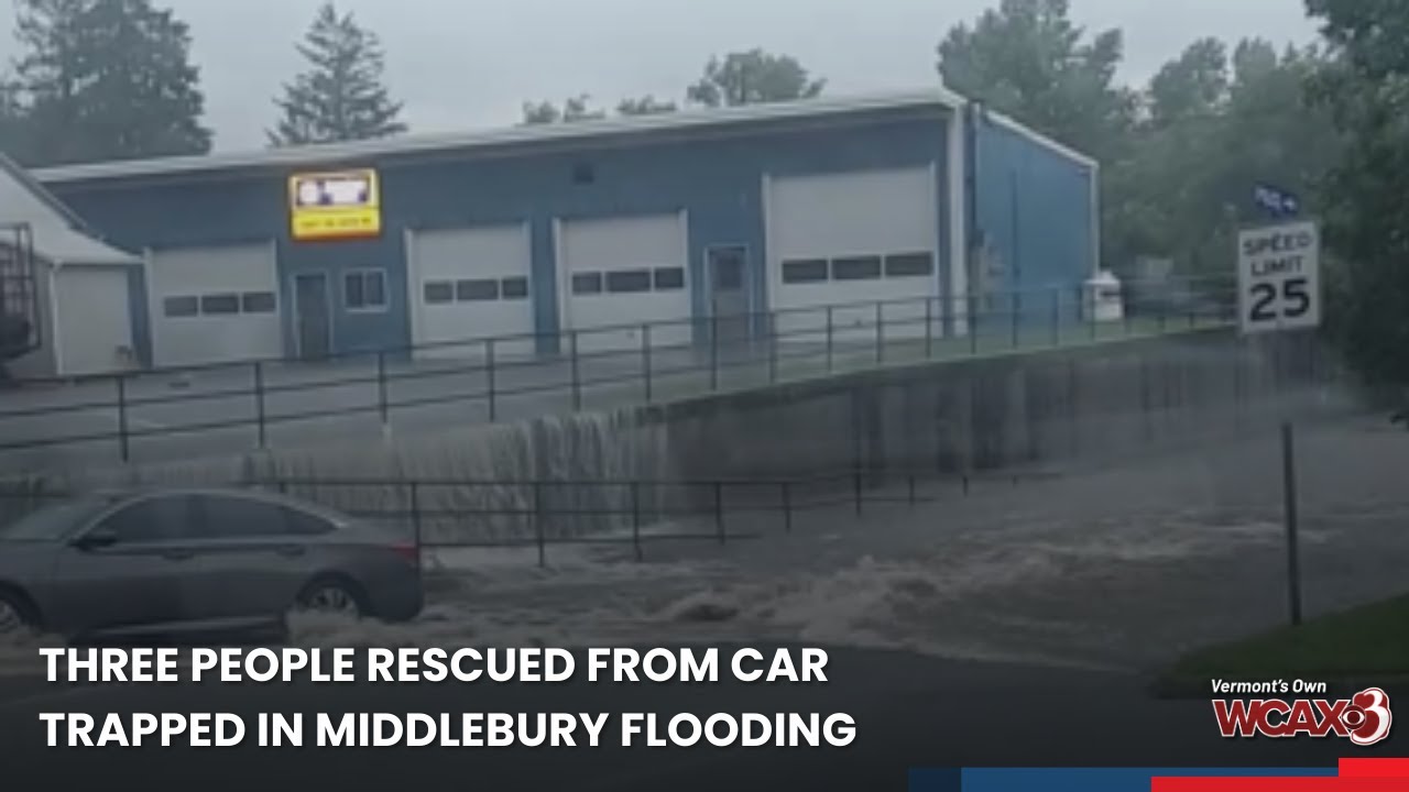 Three people rescued from car trapped in Middlebury flooding - YouTube