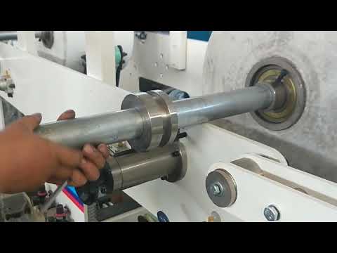 How to load jumbo roll raw paper - YouTube