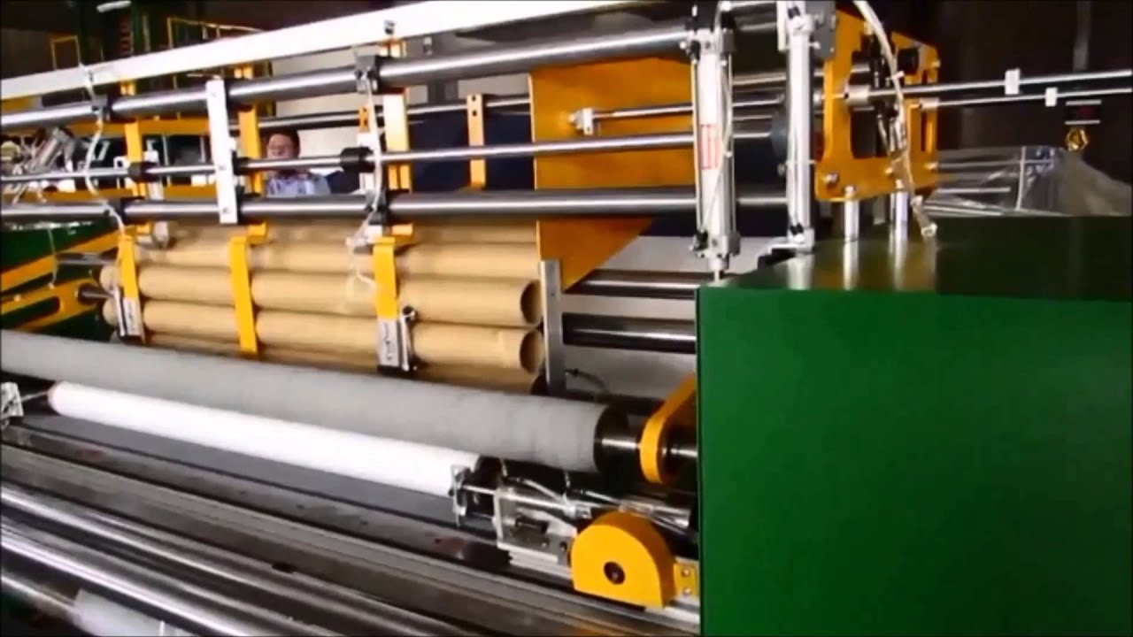 Jumbo Roll to Roll Re winder with Shaft less Core Changing System - YouTube