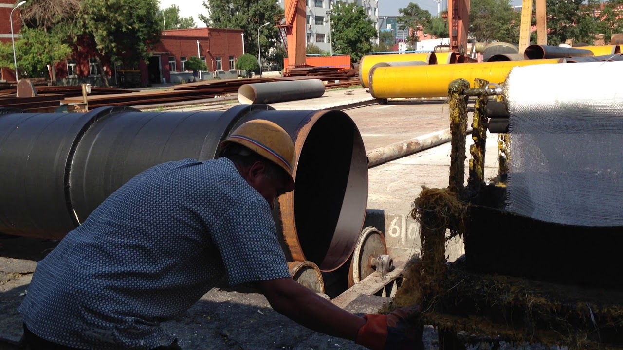Fiberglass fabirc on Epoxy coal tar coated steel pipe - YouTube