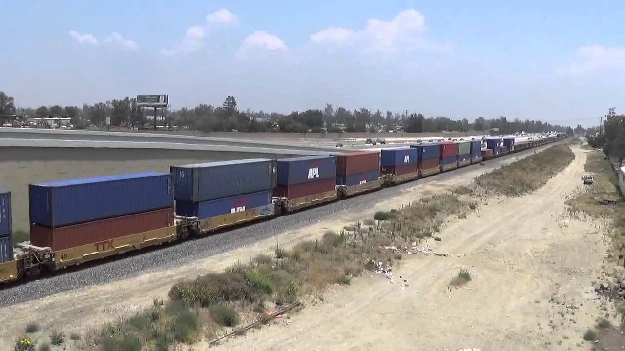 UP 7964 '5000th GEVO' and 2002 leading intermodal - YouTube