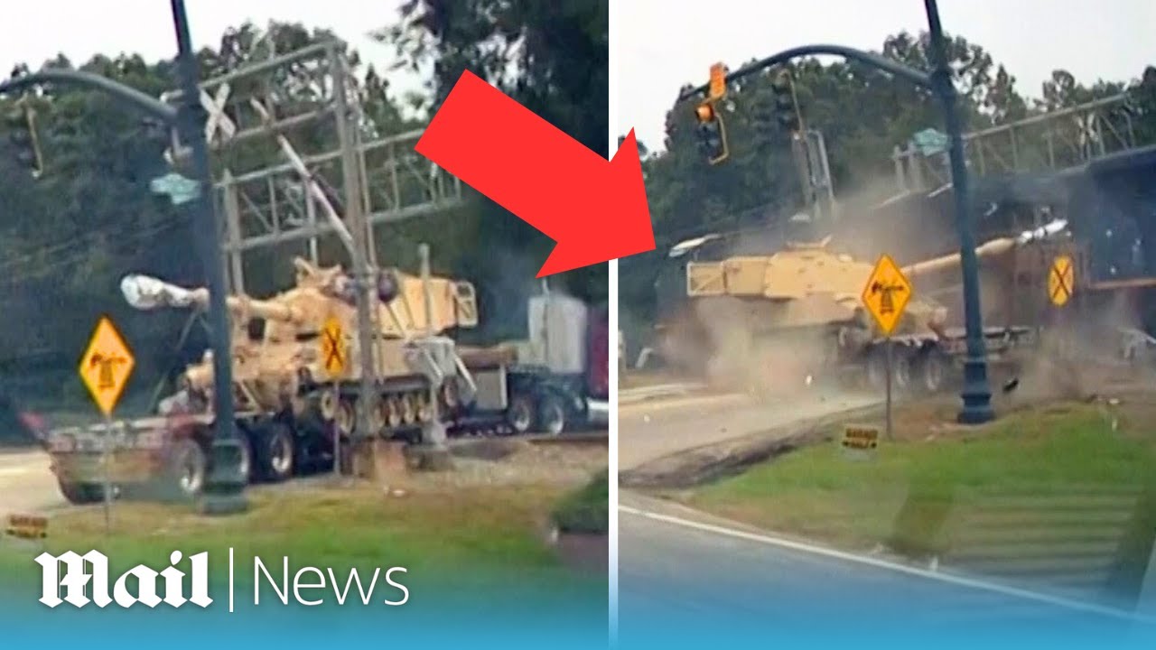 Terrifying moment Howitzer tank gets slammed by CSX freight train in ...