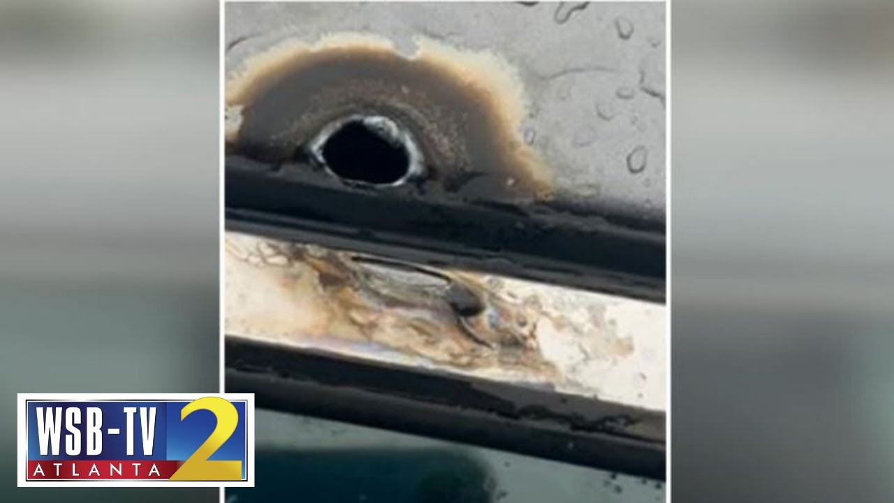 Lightning strike leave holes in metro Atlanta woman's car - YouTube