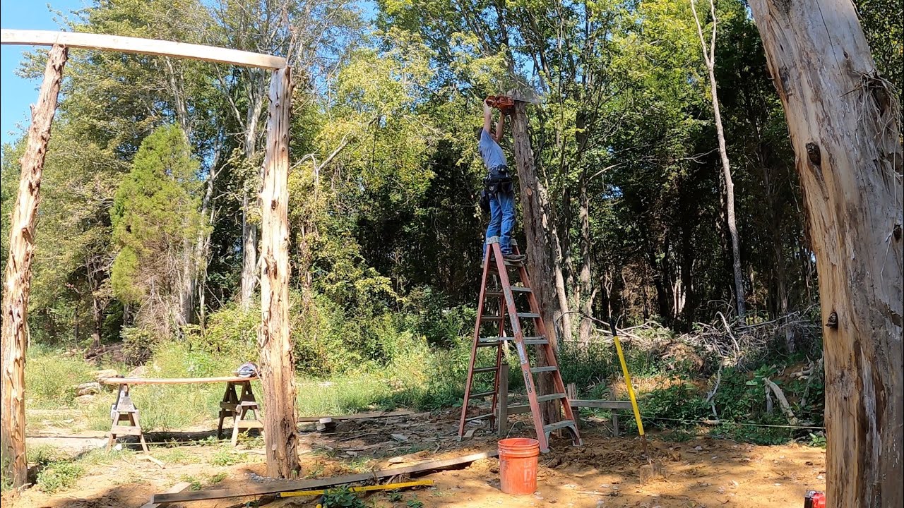 Notching posts and installing headers!! - YouTube