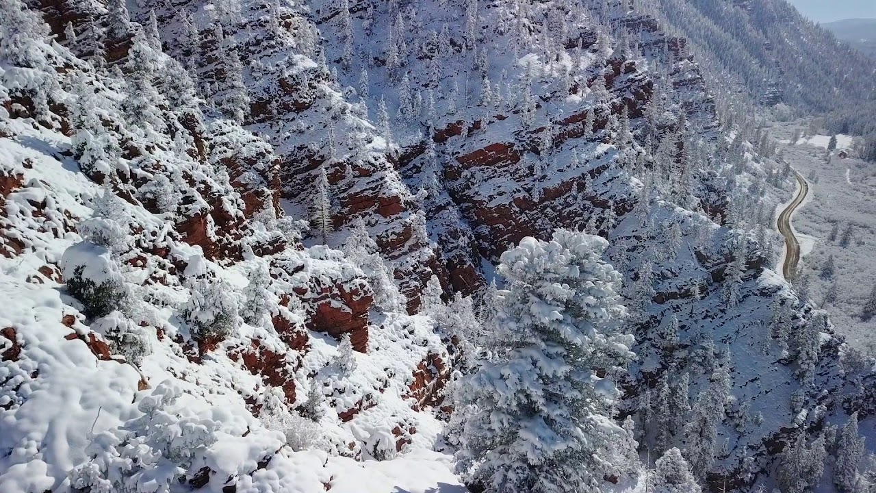 Cinematic Aerial Views of Red Rock Canyon with Fresh Snow - YouTube
