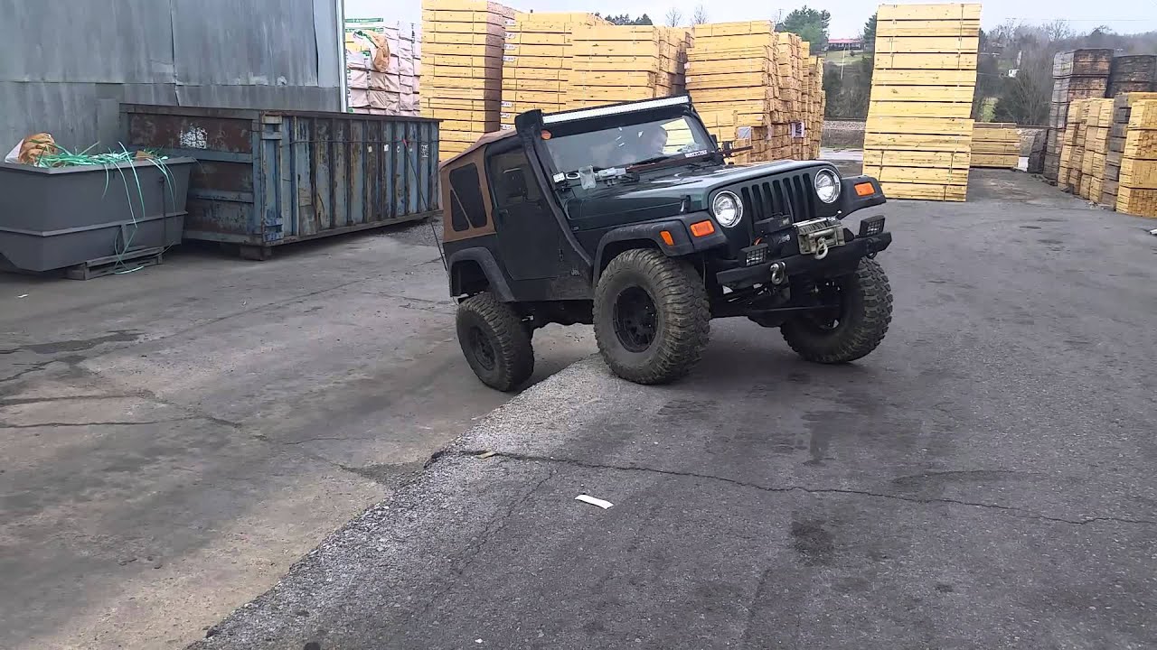 Jeep tj climbing and flex skyjacker 4in lift - YouTube