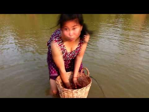 Primitive Technology - cute girl catch fish in river - cooking red fish delicious