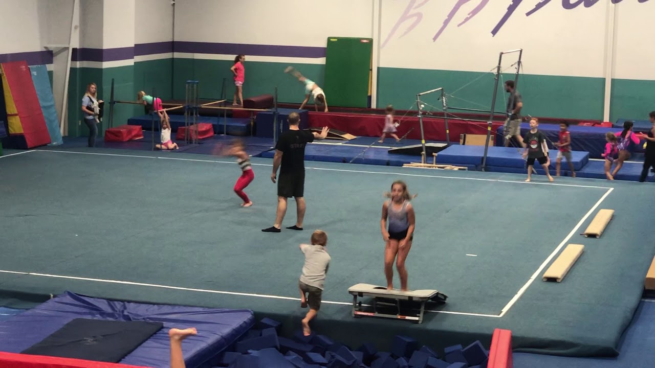 Round off backhand spring back layout step out 9/21/19 age 8 - YouTube