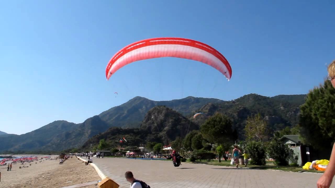 Paraglider landing - YouTube