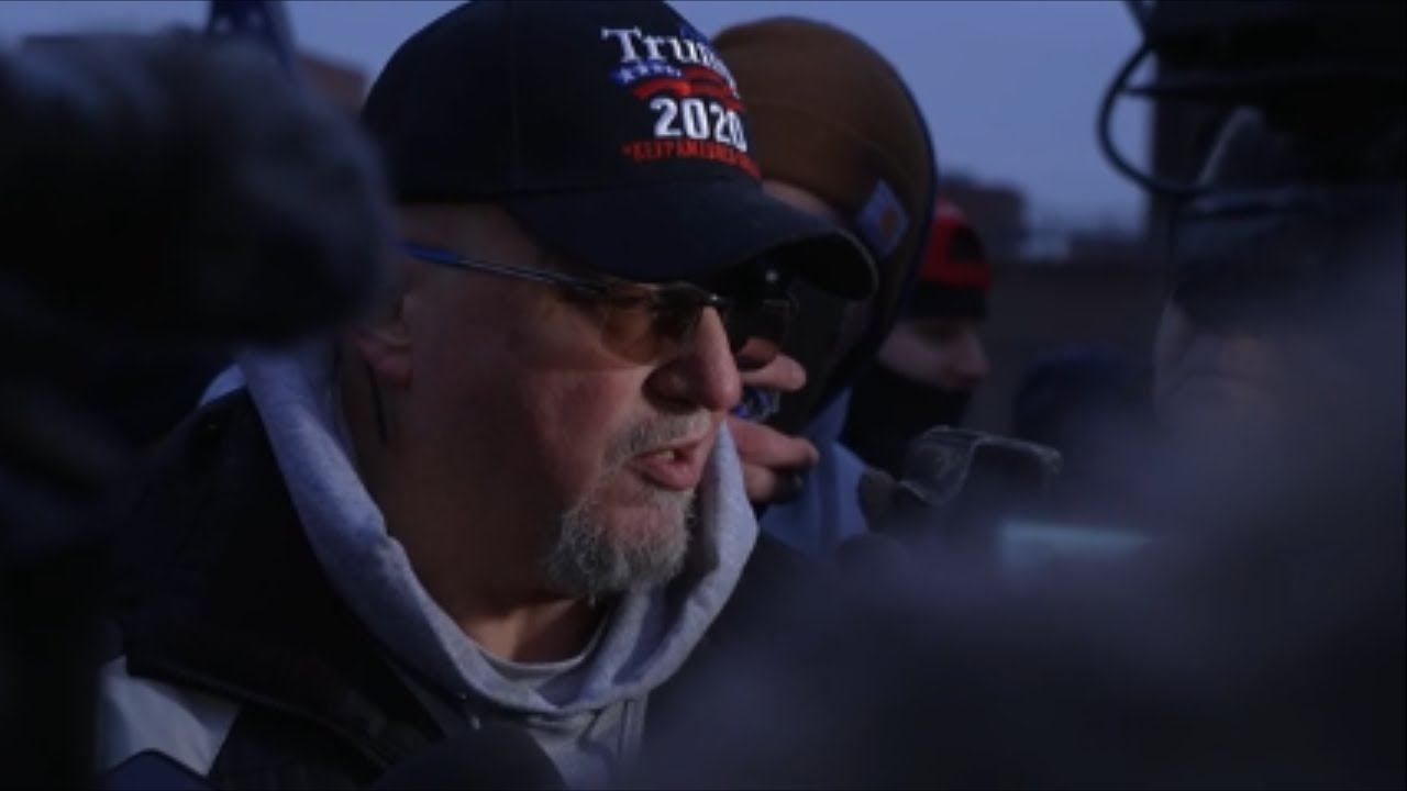 Stewart Rhodes, the founder of the Oath Keepers speaks to reporters ...