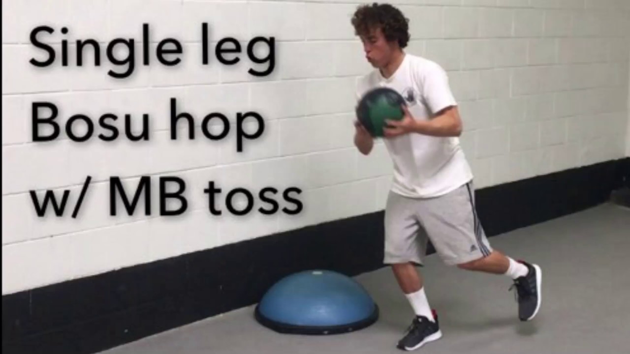 Single leg Bosu hop with medicine ball toss. Advanced exercise for ...