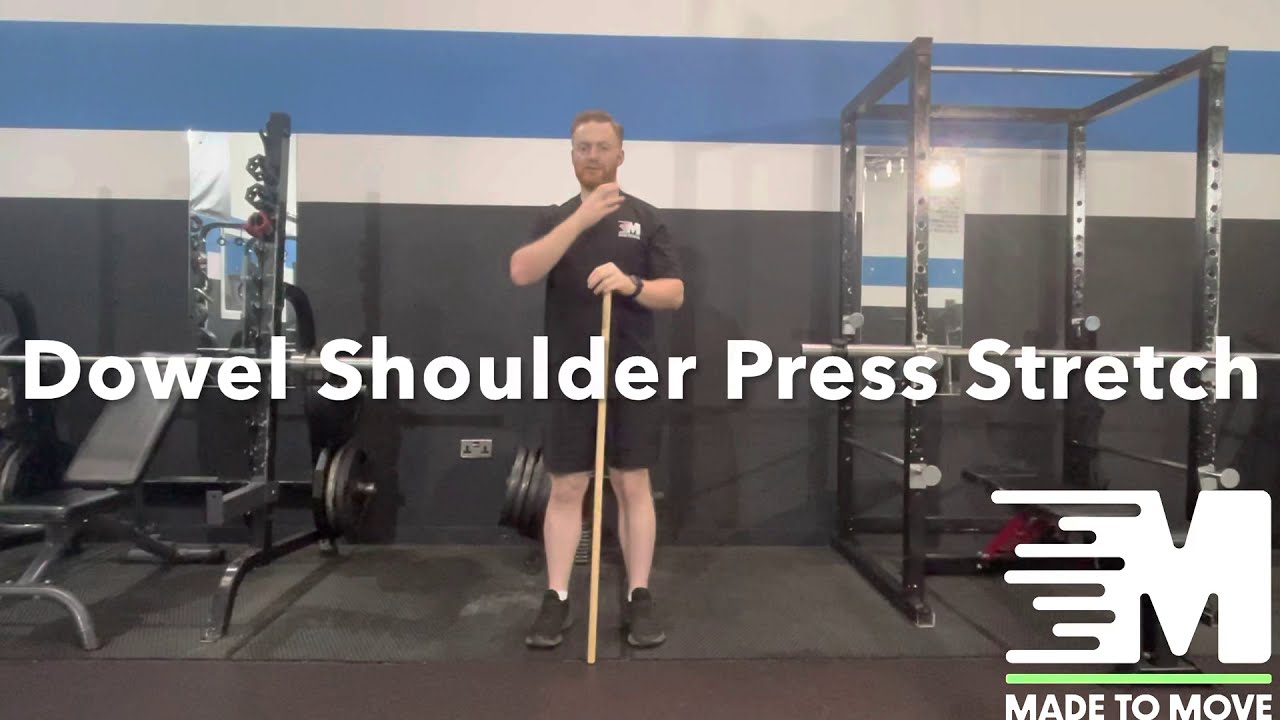 HOW TO: Dowel Shoulder Press Dynamic Stretch | Made to Move - YouTube