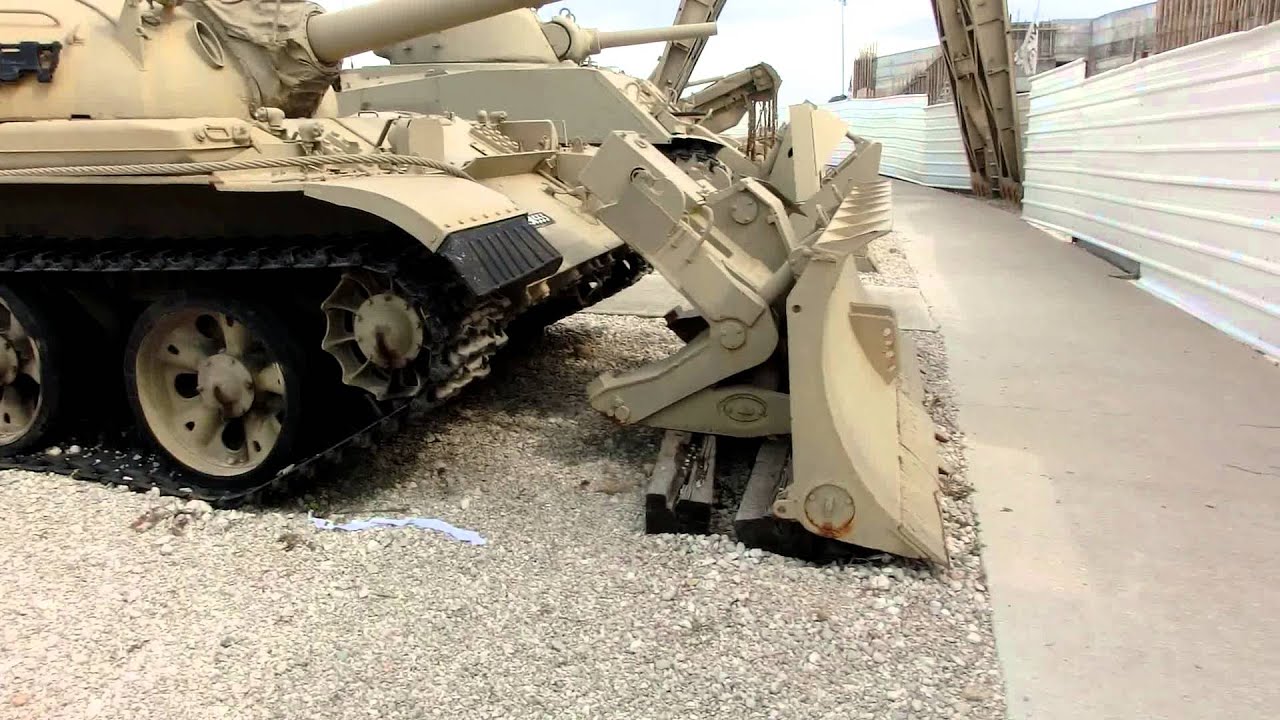 IDF Tiran-5s, a modified Soviet T-55 with bulldozer capability - YouTube