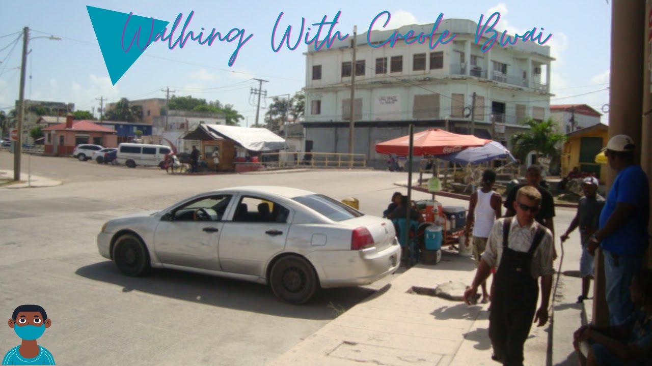 Walking in the rain on king street.#belize #kriol #tour #southside # ...