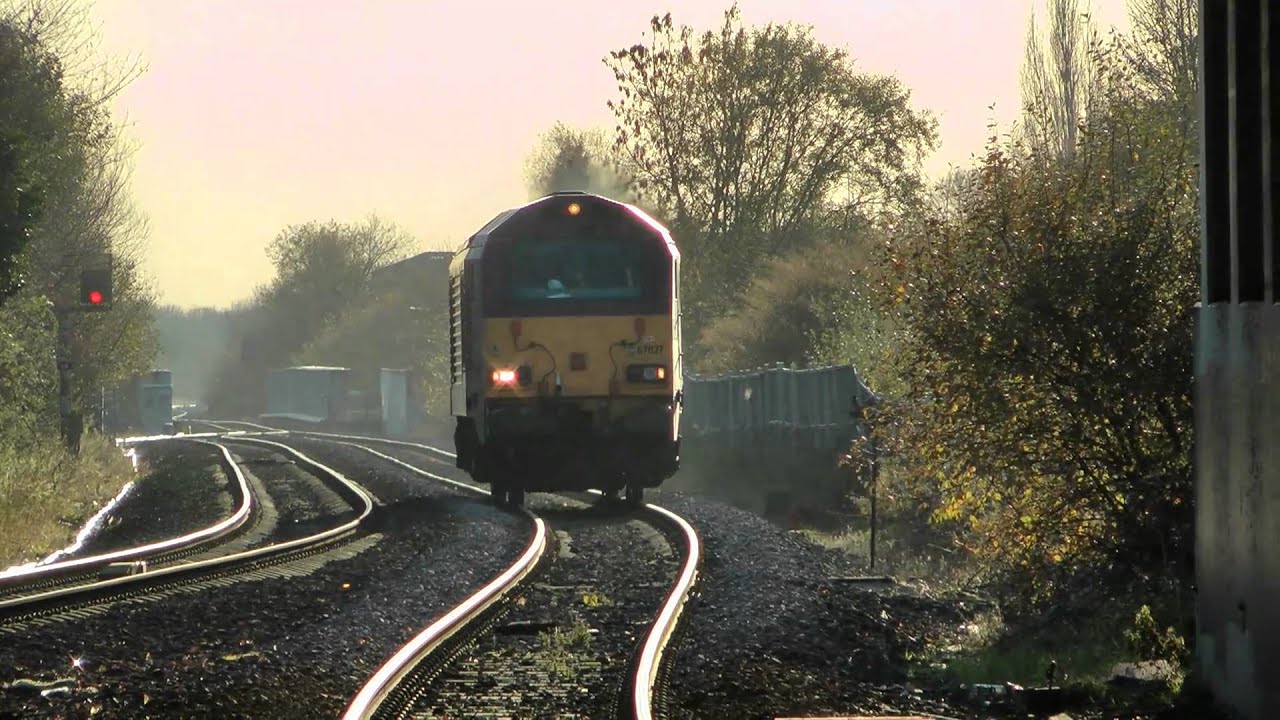 67027 passing light engine through Denton station - YouTube