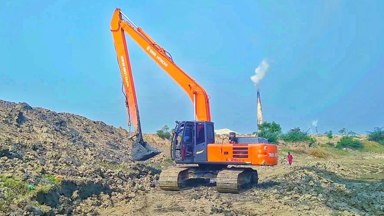 TATA HITACHI EX 215 super long reach Excavator working on the soil ...