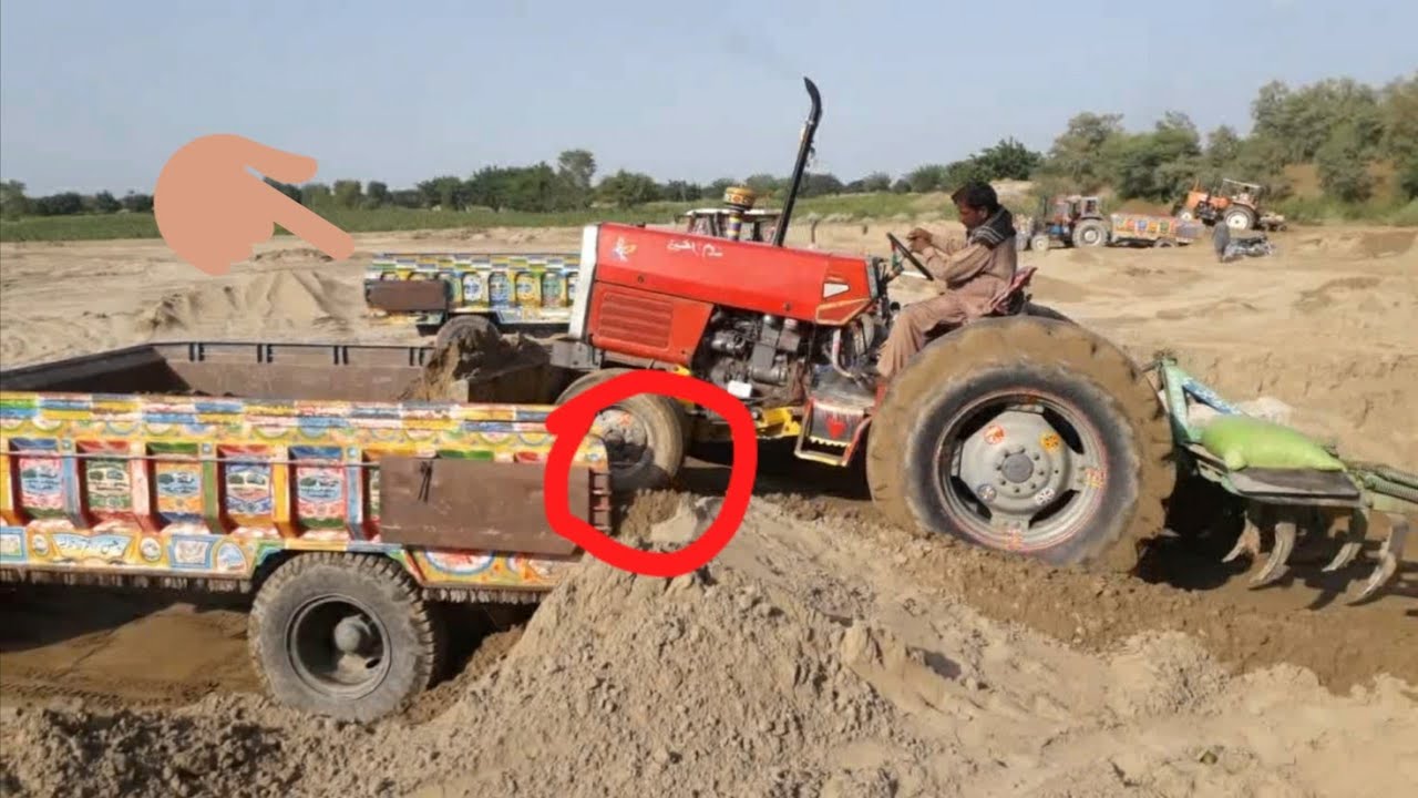 MF 385 work on farnt blade and MF 385 pull out heavy loaded trolley ...