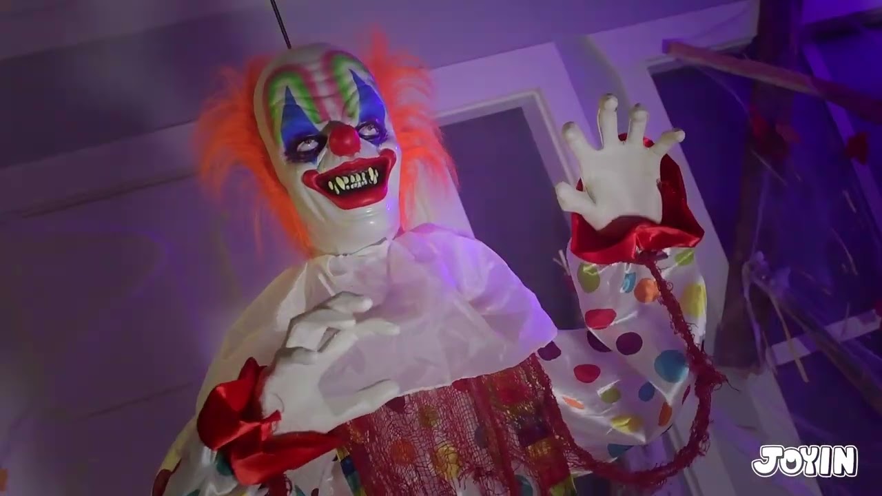 This Hanging Clown Has Unique Neon Face and Posable Arms | Halloween ...