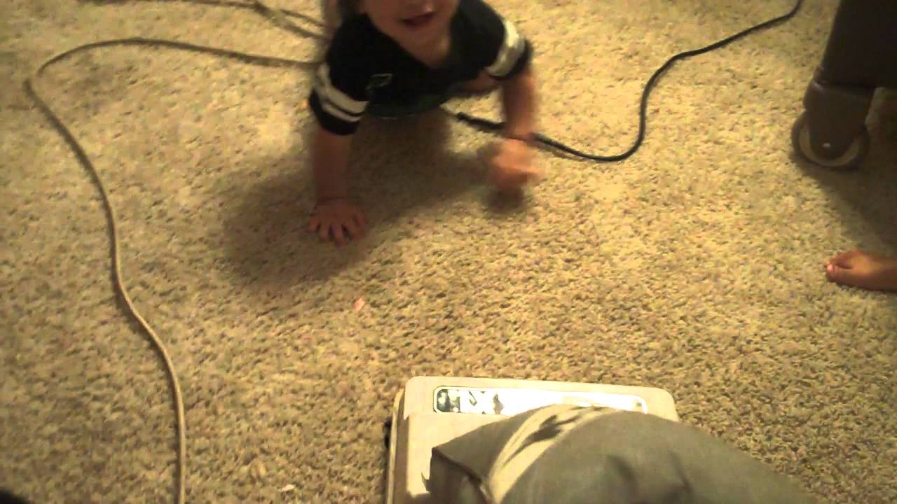 funny Baby attacks vaccuum - YouTube