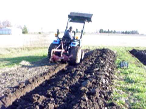 Plowing the garden - YouTube
