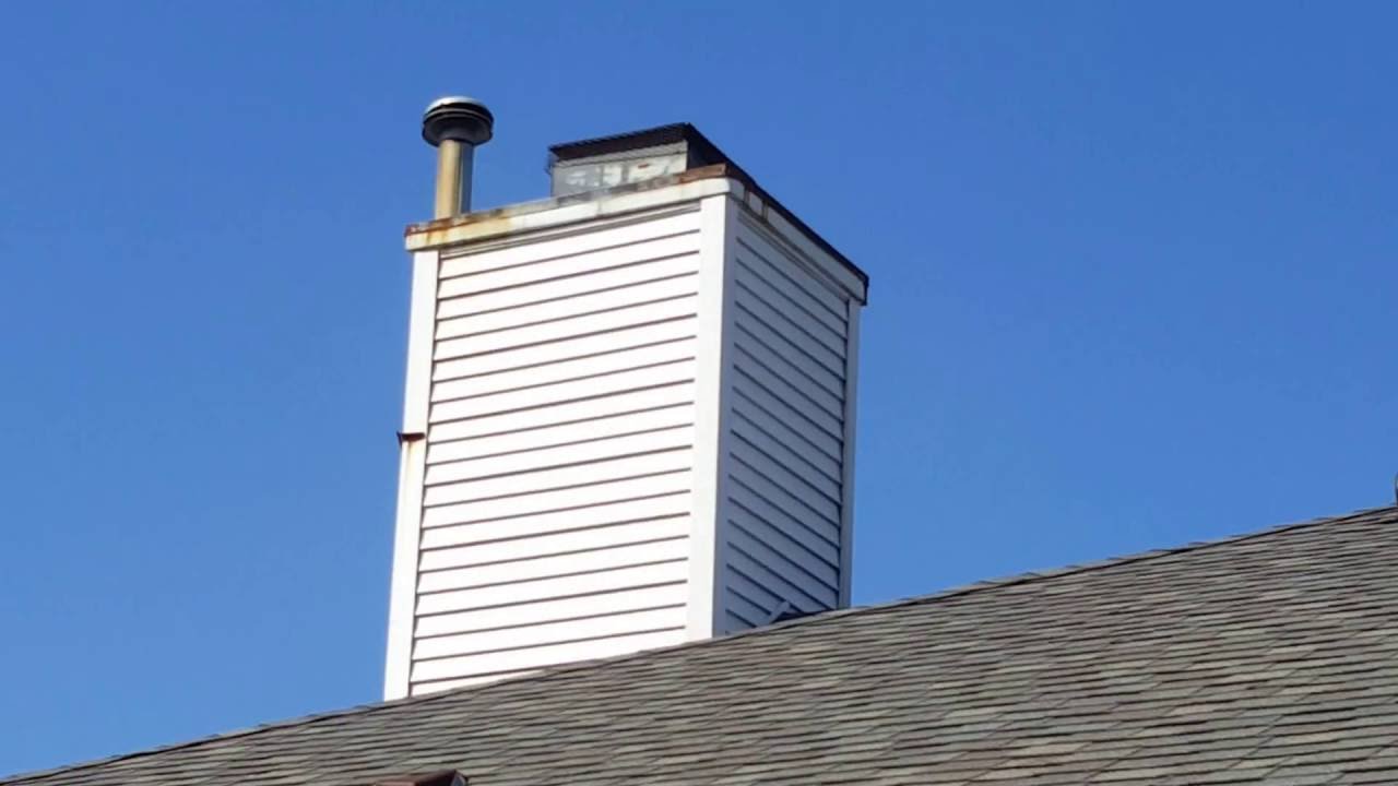 Rusted chimney chase cover. - YouTube