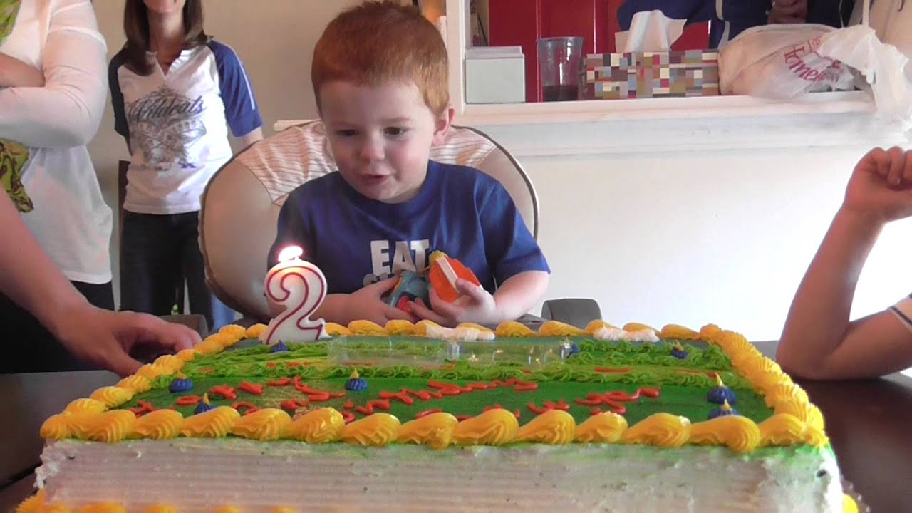 Blowing out birthday candle. 2nd try is awesome - YouTube