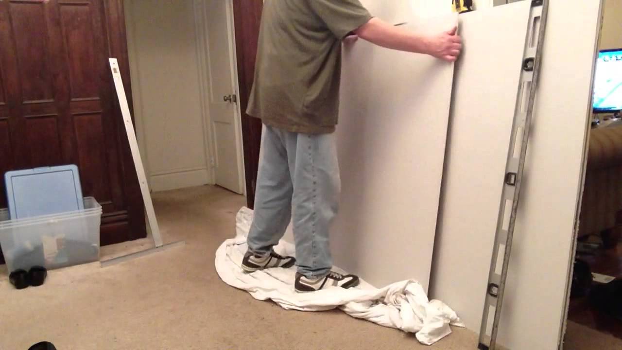 How to cut drywall with a t square - YouTube