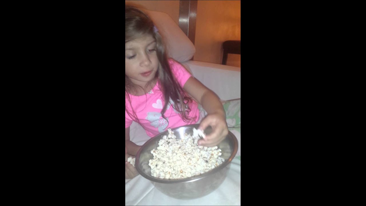 Kids eating popcorn with their feet. - YouTube