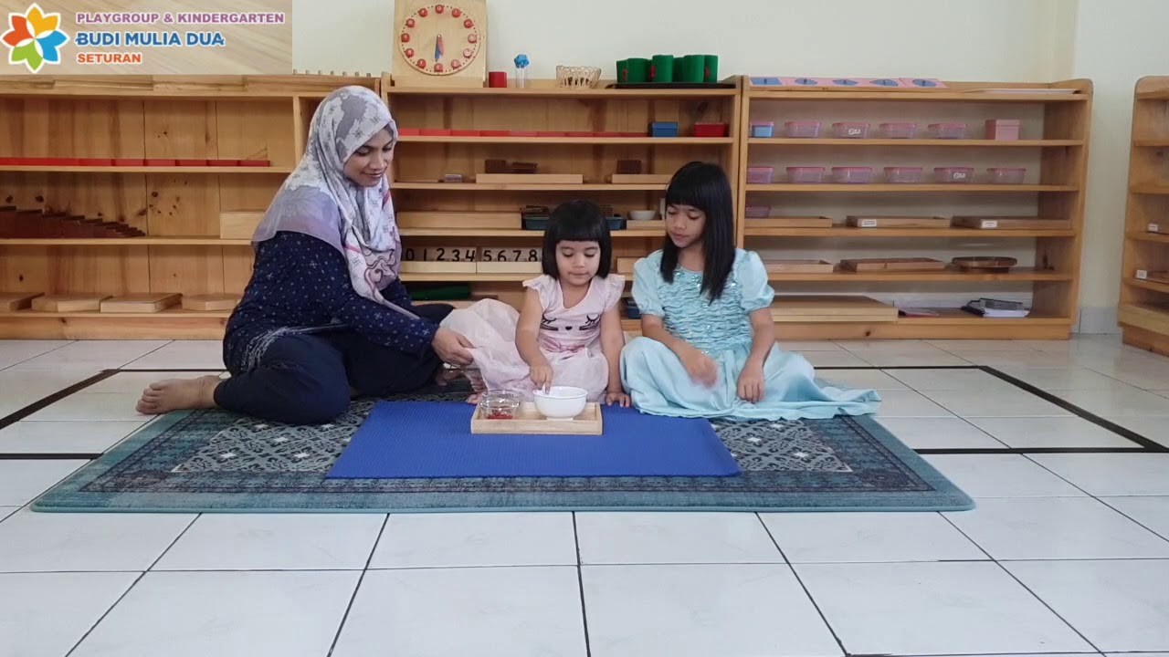 spooning from one bowl to two unequal bowls (montessori practical life ...