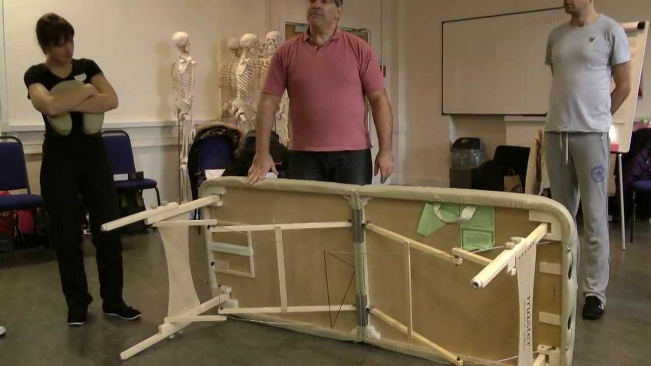 setting and carrying the massage table - YouTube