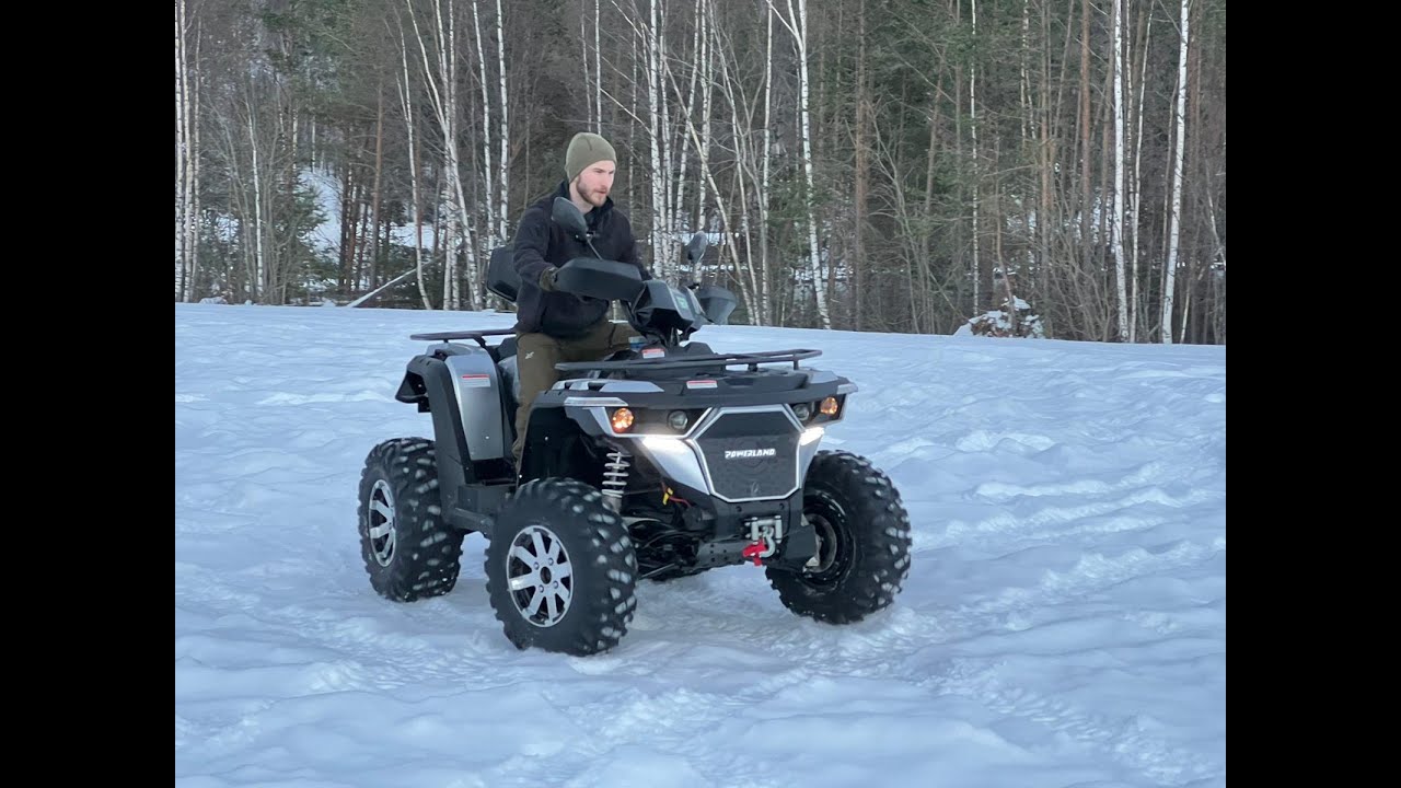 Powerland Xplore electric ATV gliding through the Norwegian snow ...