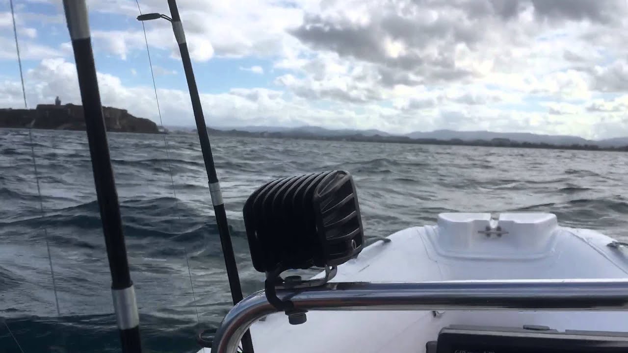 Caribe 13 feet off shore cruising 2-5 feet waves - YouTube