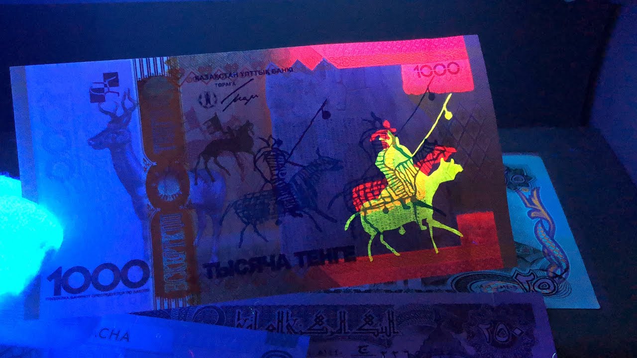 Looking at 10 banknotes in ultraviolet light - part 6 - YouTube