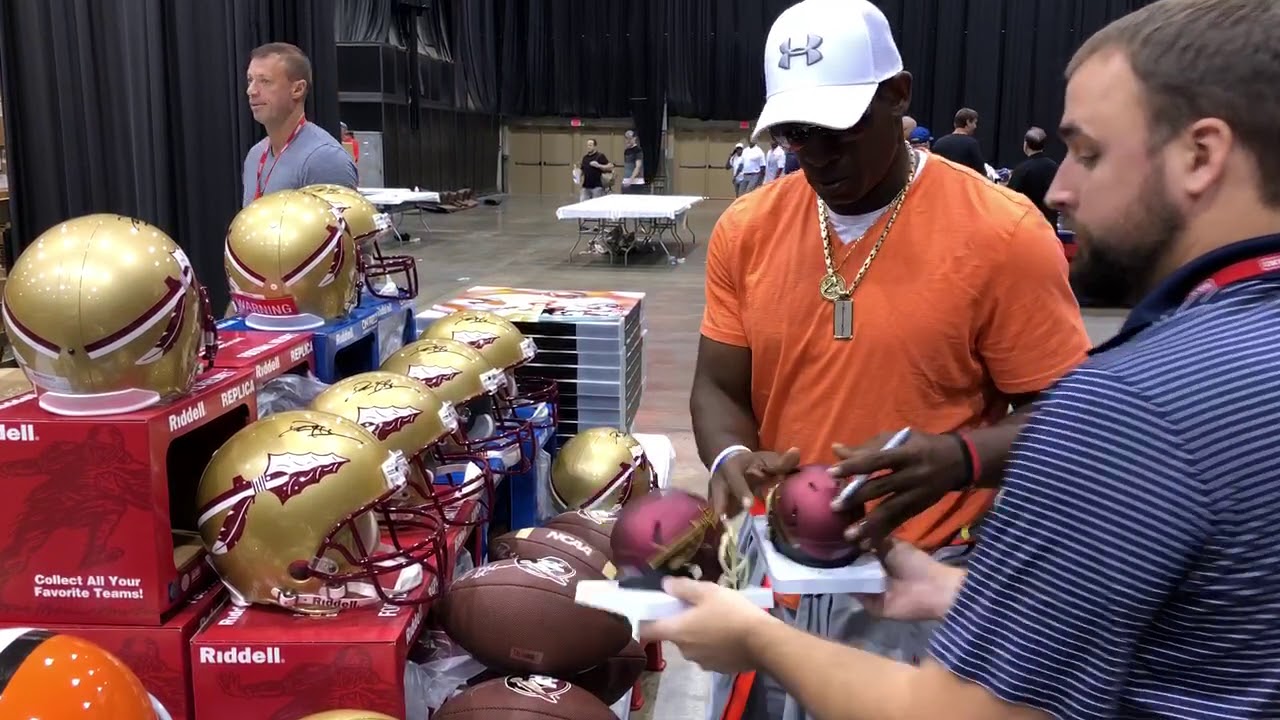 Deion Sanders Signing Florida State Memorabilia - YouTube