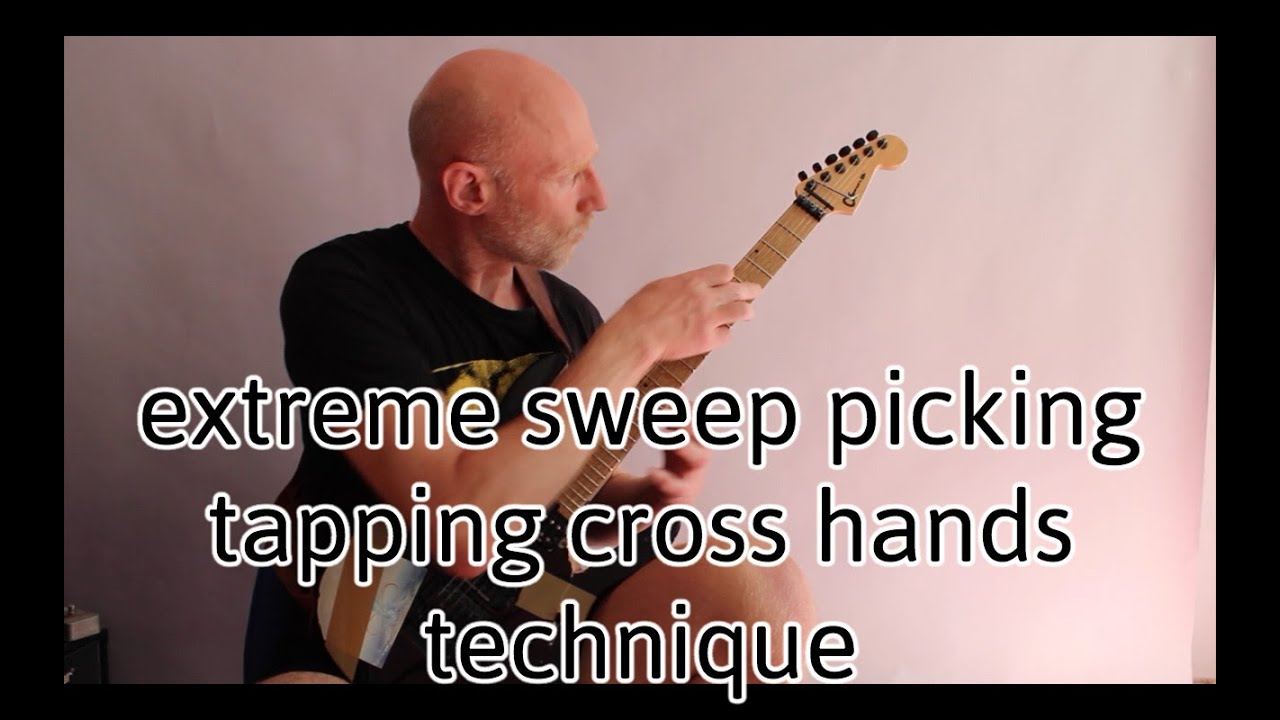 Extreme tapping sweep picking and cross hands techniques - YouTube