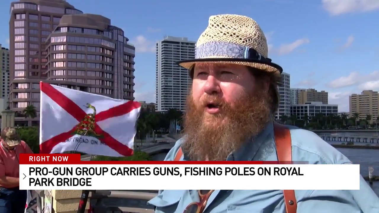 Pro-gun group carries guns, fishing poles on Royal Park Bridge as ...