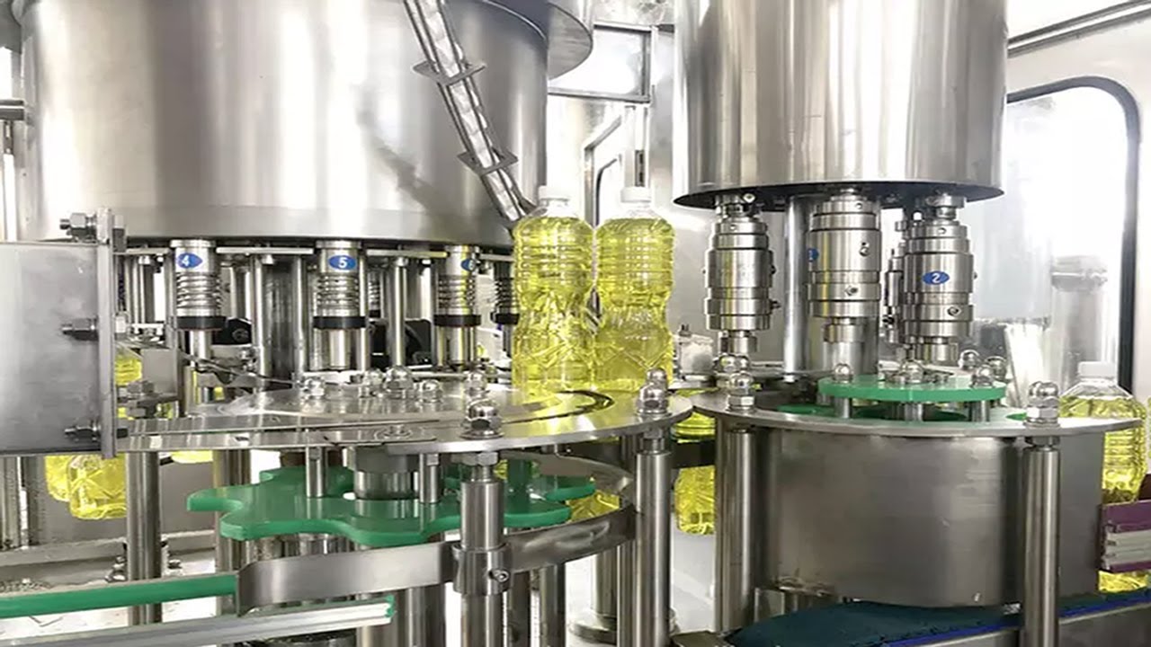 Cooking oil bottles filling capping rotary type monoblock equipment ...