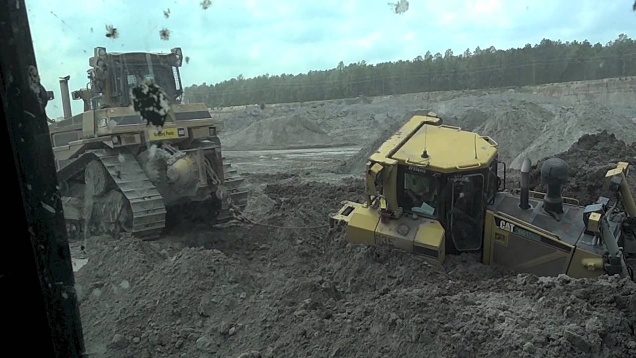 Caterpillar D-8 Bulldozer Stuck In The Mud D-9 Pulls it Out - YouTube