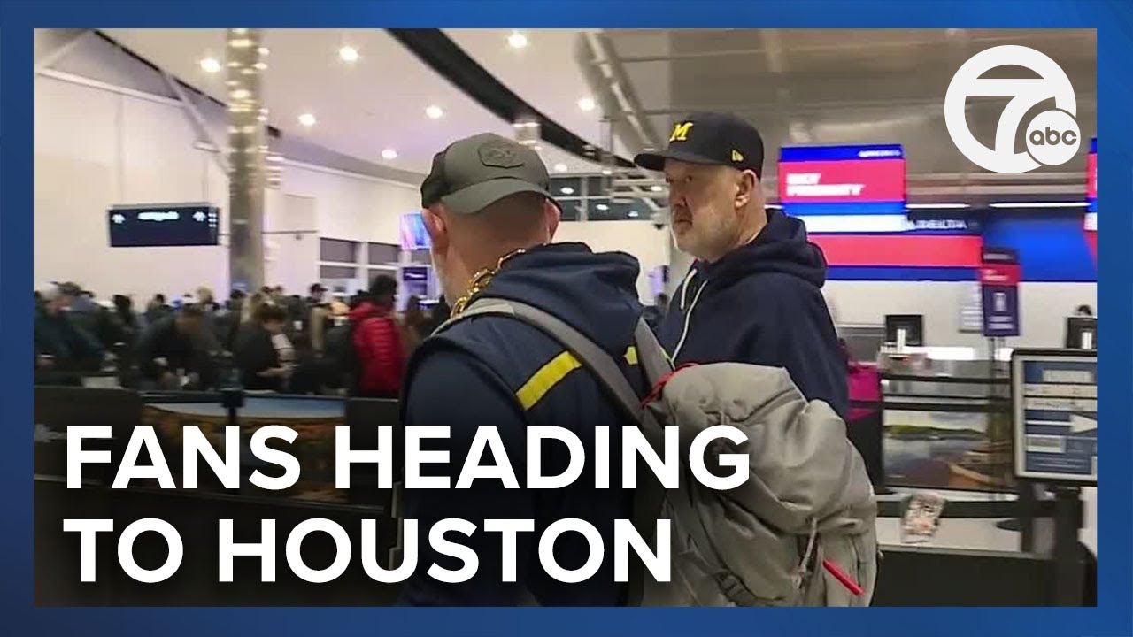 Michigan fans arriving at DTW en route to Houston for National ...