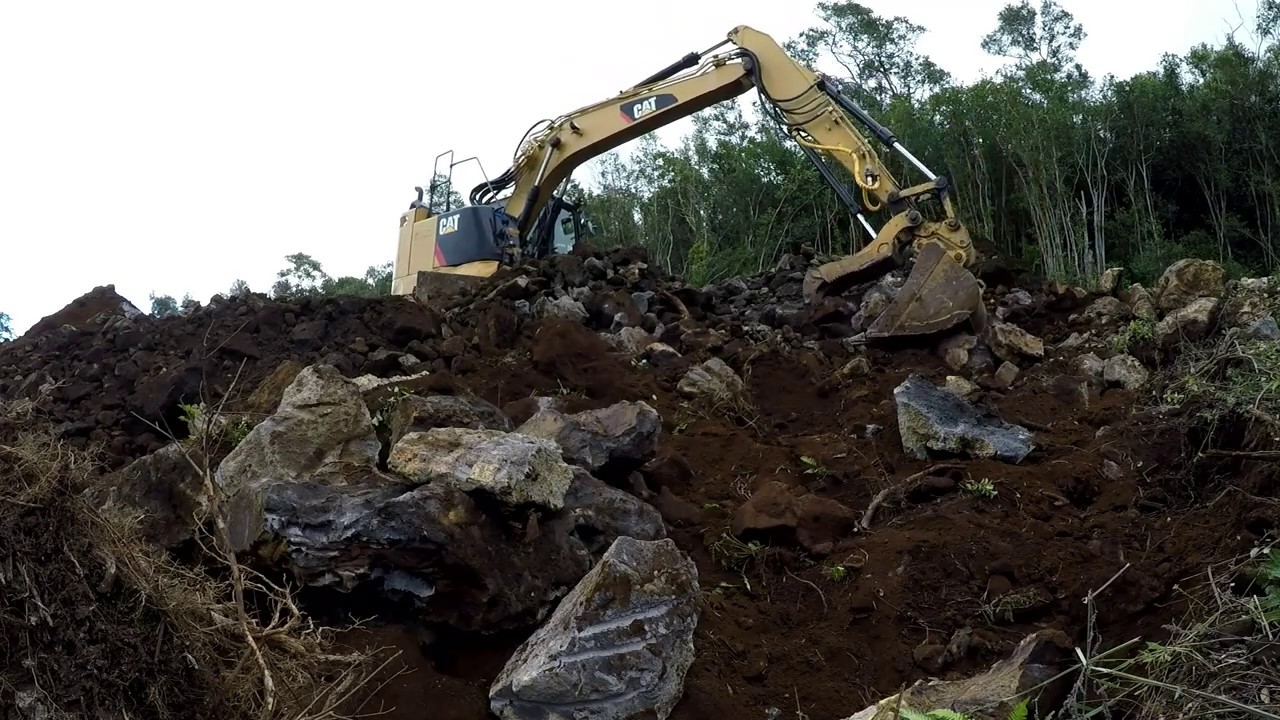 Packing Rock into a Steep Slope - YouTube